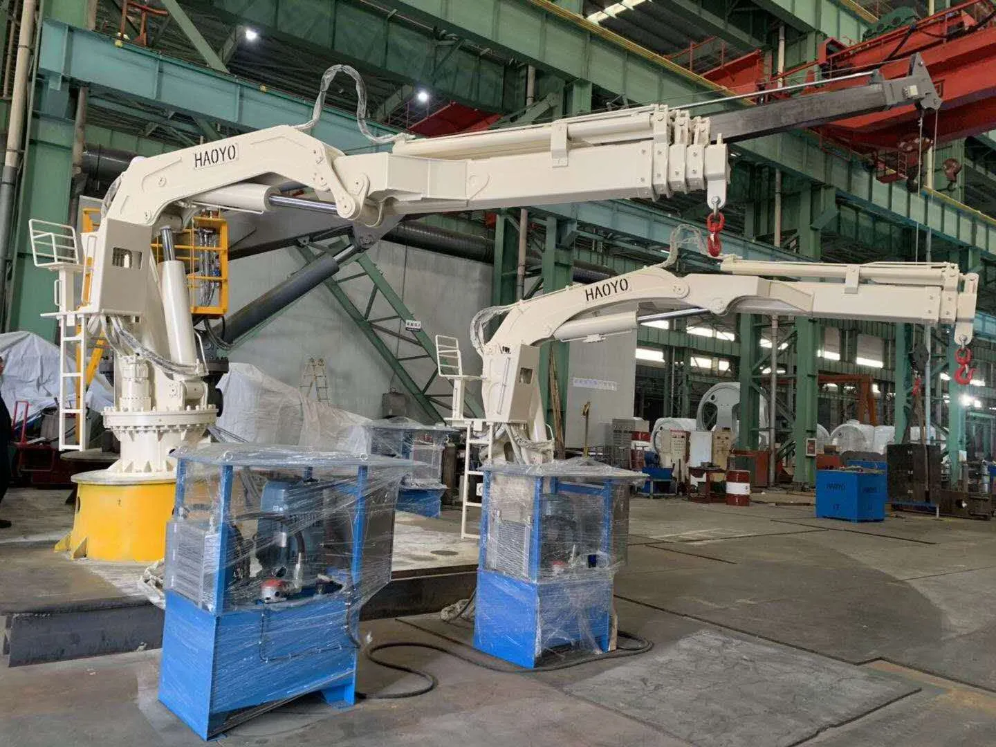 Two fully foldable and telescopic boom marine crane ready for shipment ...