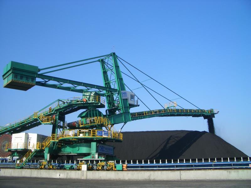 luffing and slewing stacker system for coal stacking in coal terminal stock